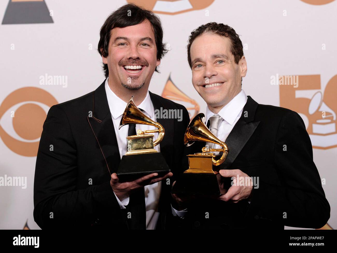 Duncan Sheik, left, and Steven Sater are seen with the award for best ...