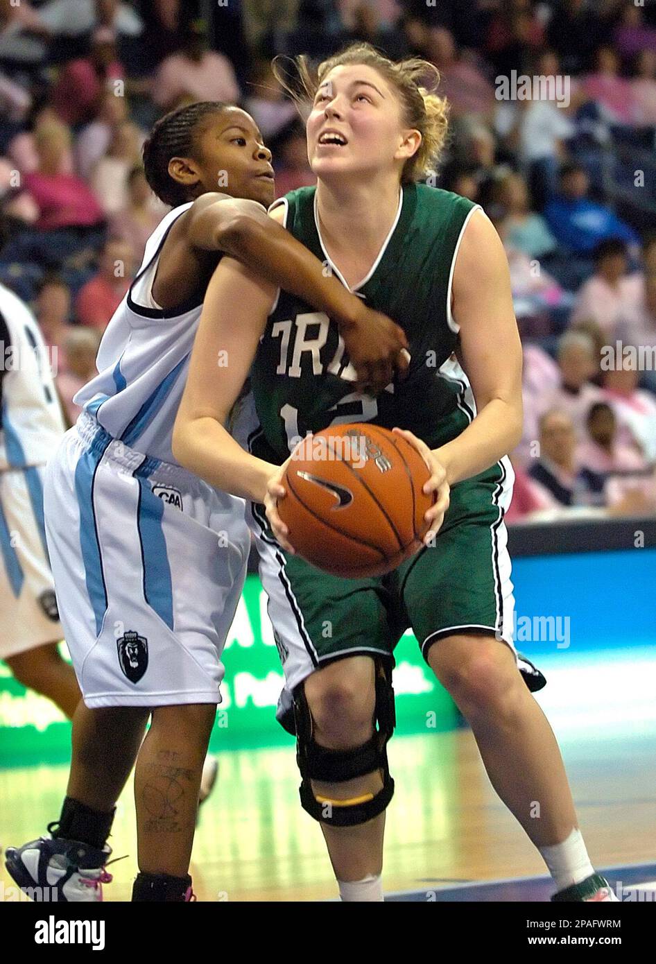 Old Dominion's, Jazzmin Walters, left, reach across the shoulder of ...