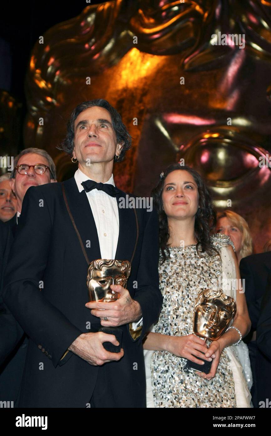 French actress Marion Cotillard, right, with her Leading Actress award ...