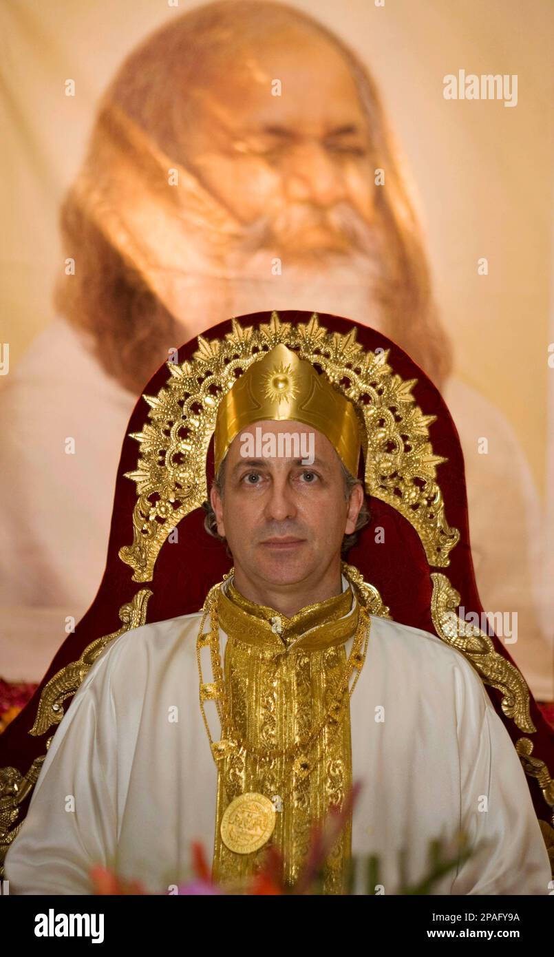 Maharishi Mahesh Yogi's (portrait seen behind) successor Maharaja ...