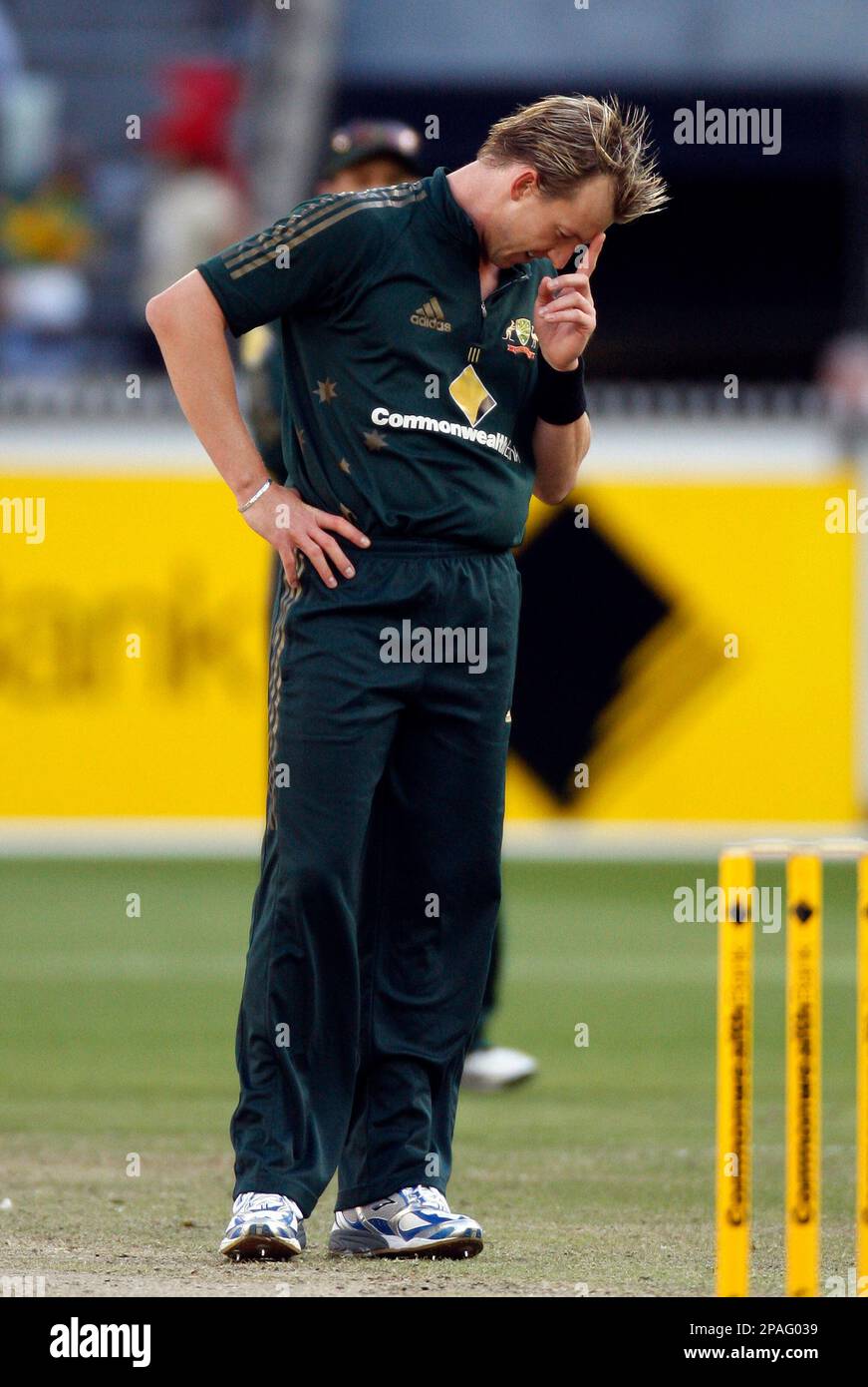 Australian bowler Brett Lee reacts during the one day international ...