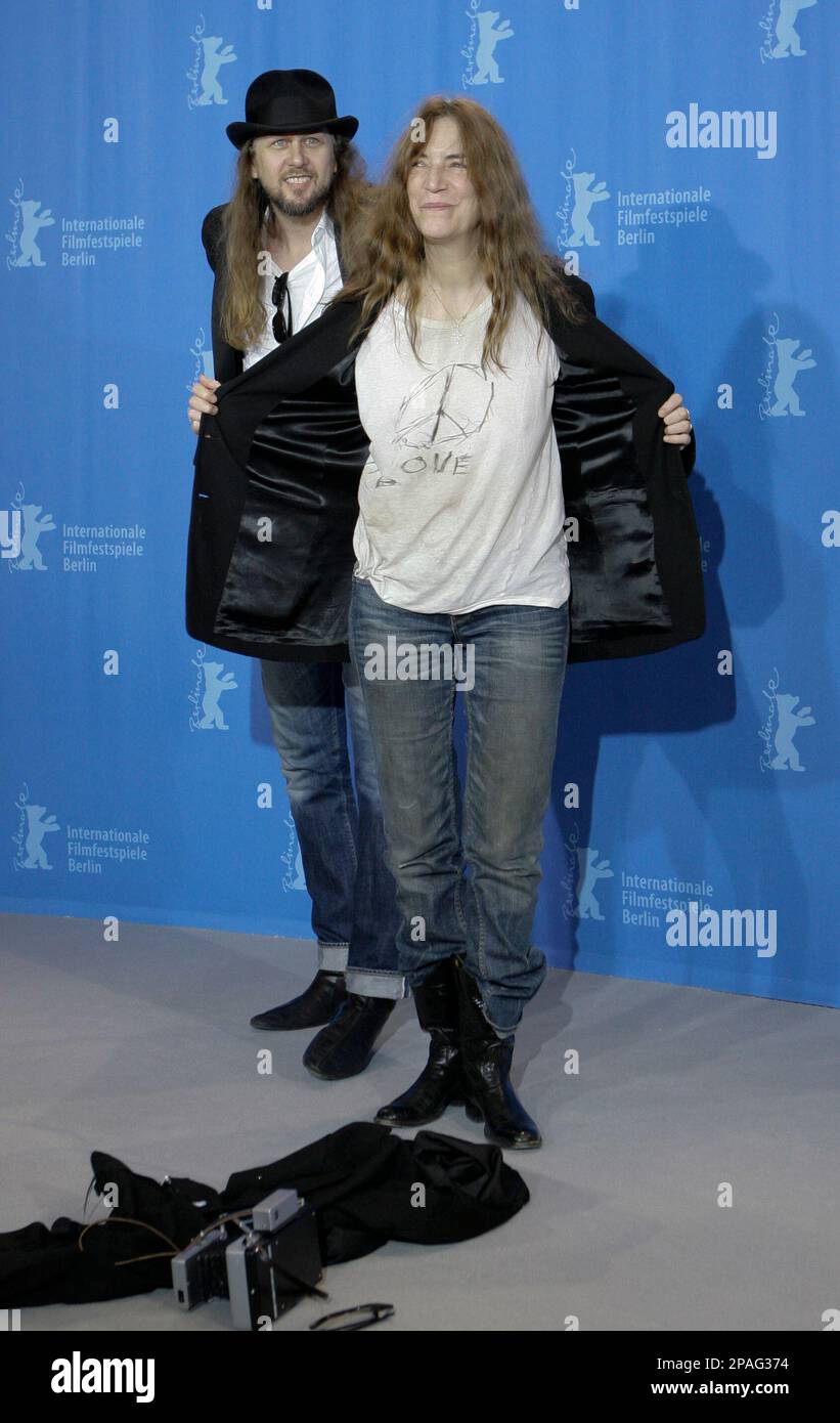 U.S. singer Patti Smith, right, and director Steven Sebring pose during ...