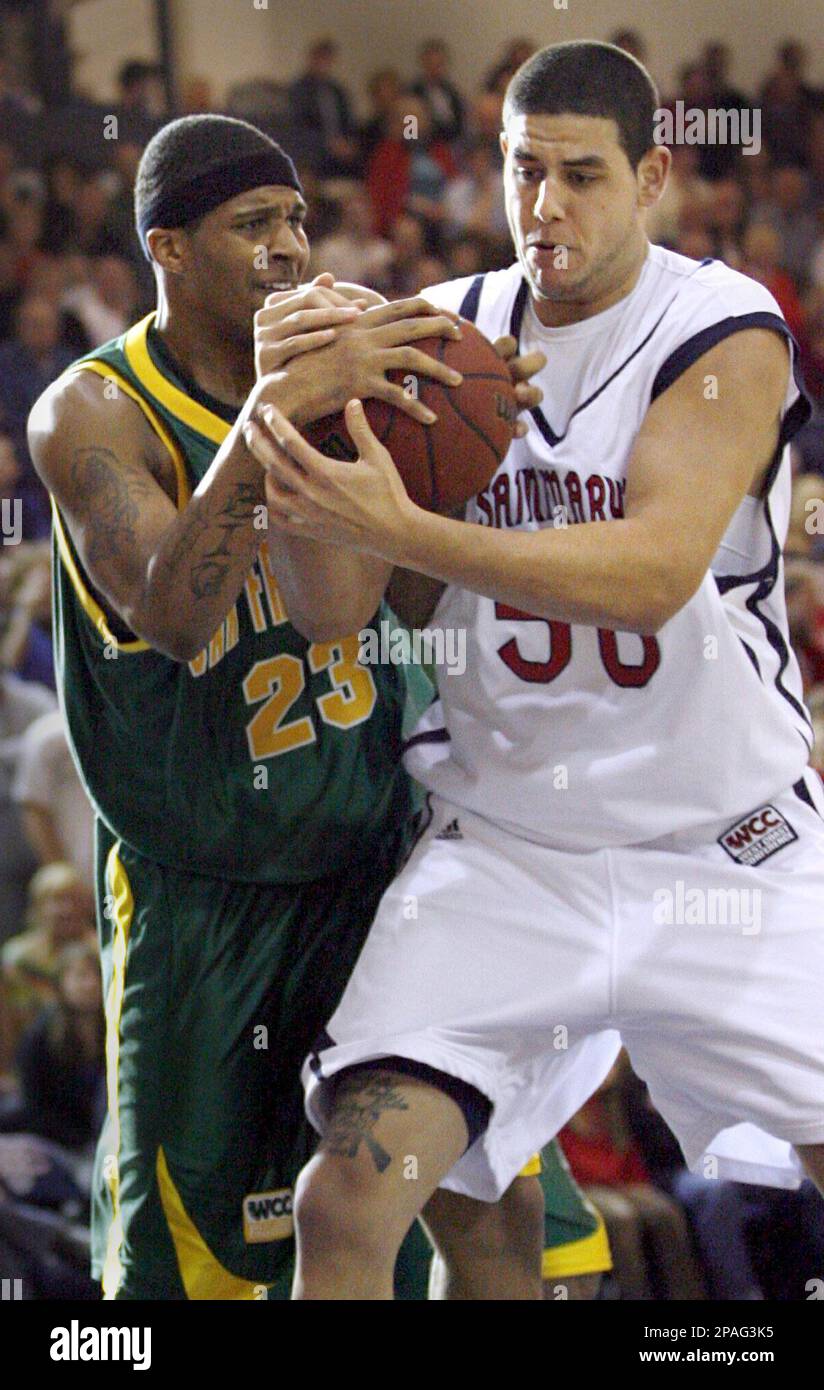 San Francisco's James Morgan (23) and Saint Mary's Omar Samhan (50 ...