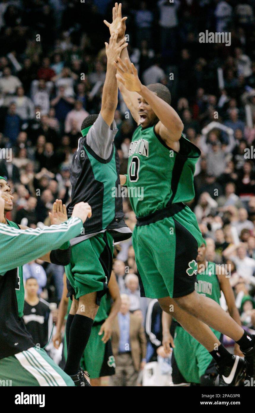 Boston Celtics' Leon Powe, right, celebrates his game-winning shot with ...