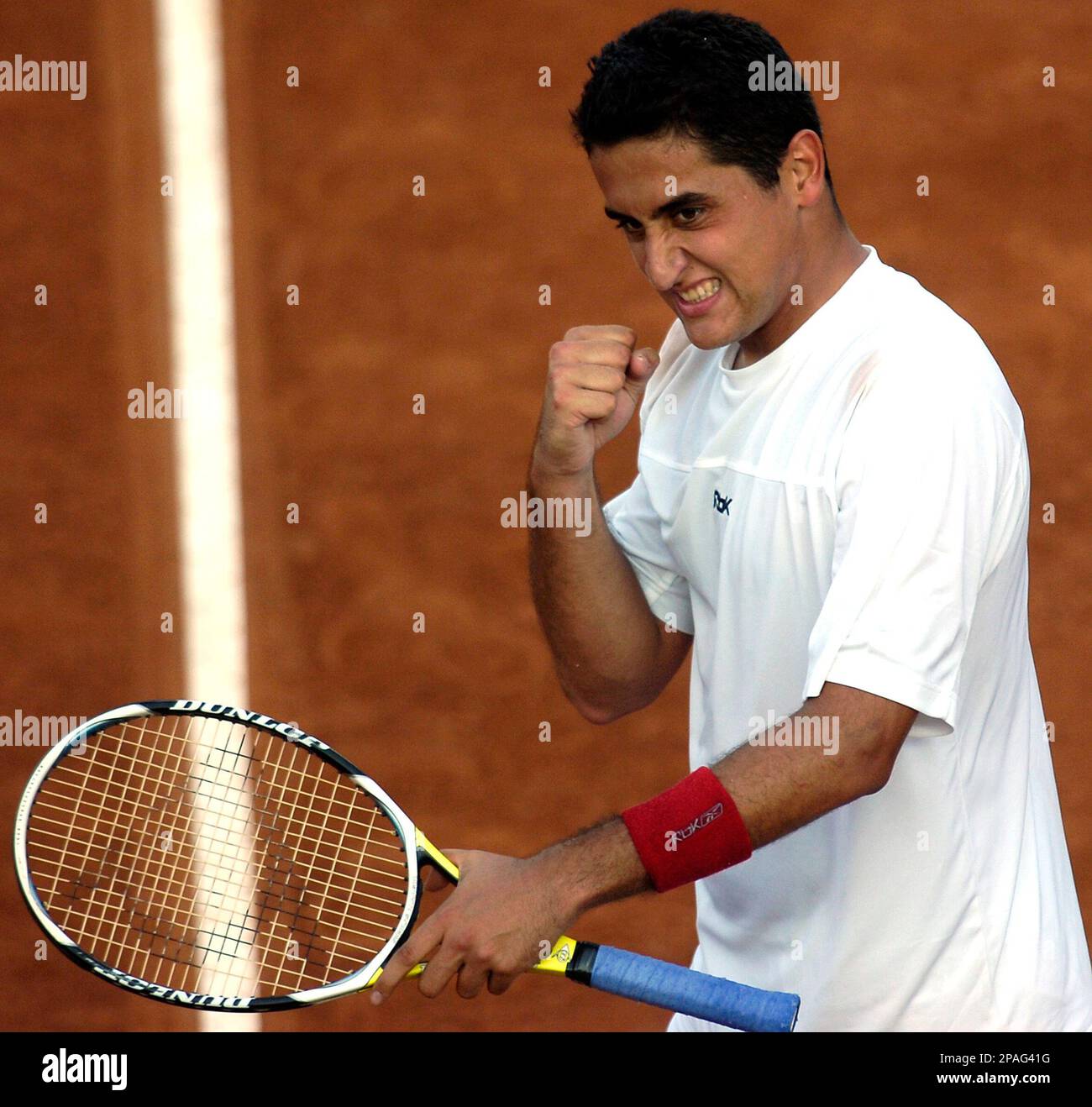 Spain's Nicolas Almagro celebrates his victory over Peru's Matias Silva ...