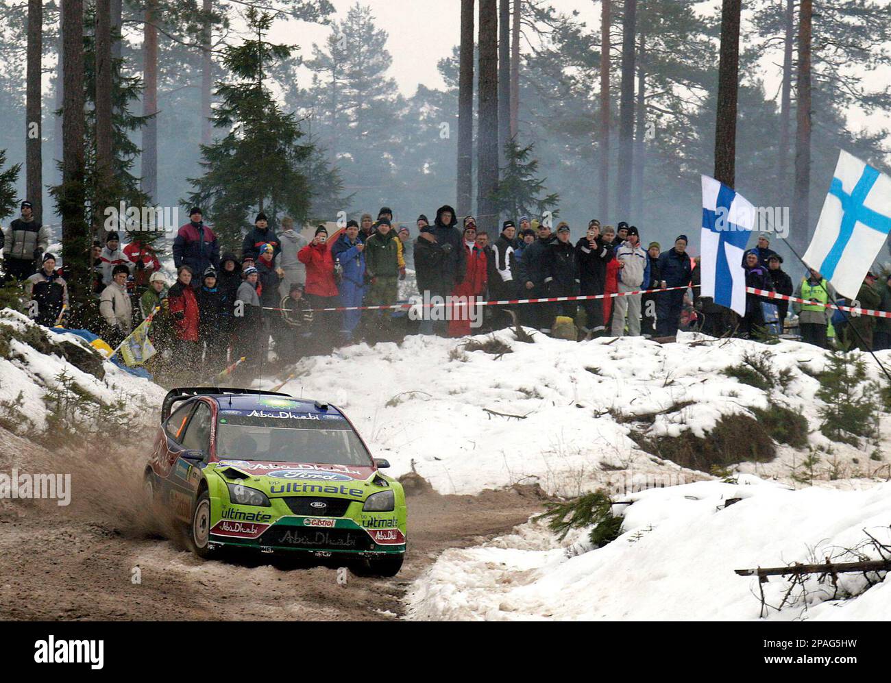 Finnish Ford Focus driver Mikko Hirvonen takes a corner during the ...