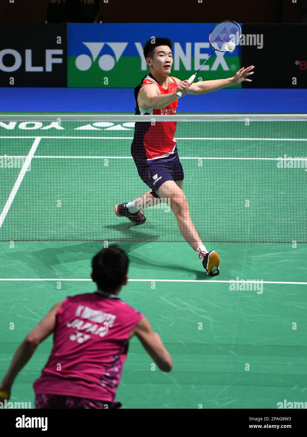 Muelheim, Germany. 11th Mar, 2023. Li Shifeng (top) of China hits a ...