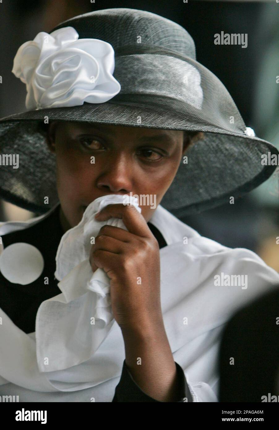 Linah Too, wife of slain opposition legislator David Kimutai Too, attends her husband's memorial ...