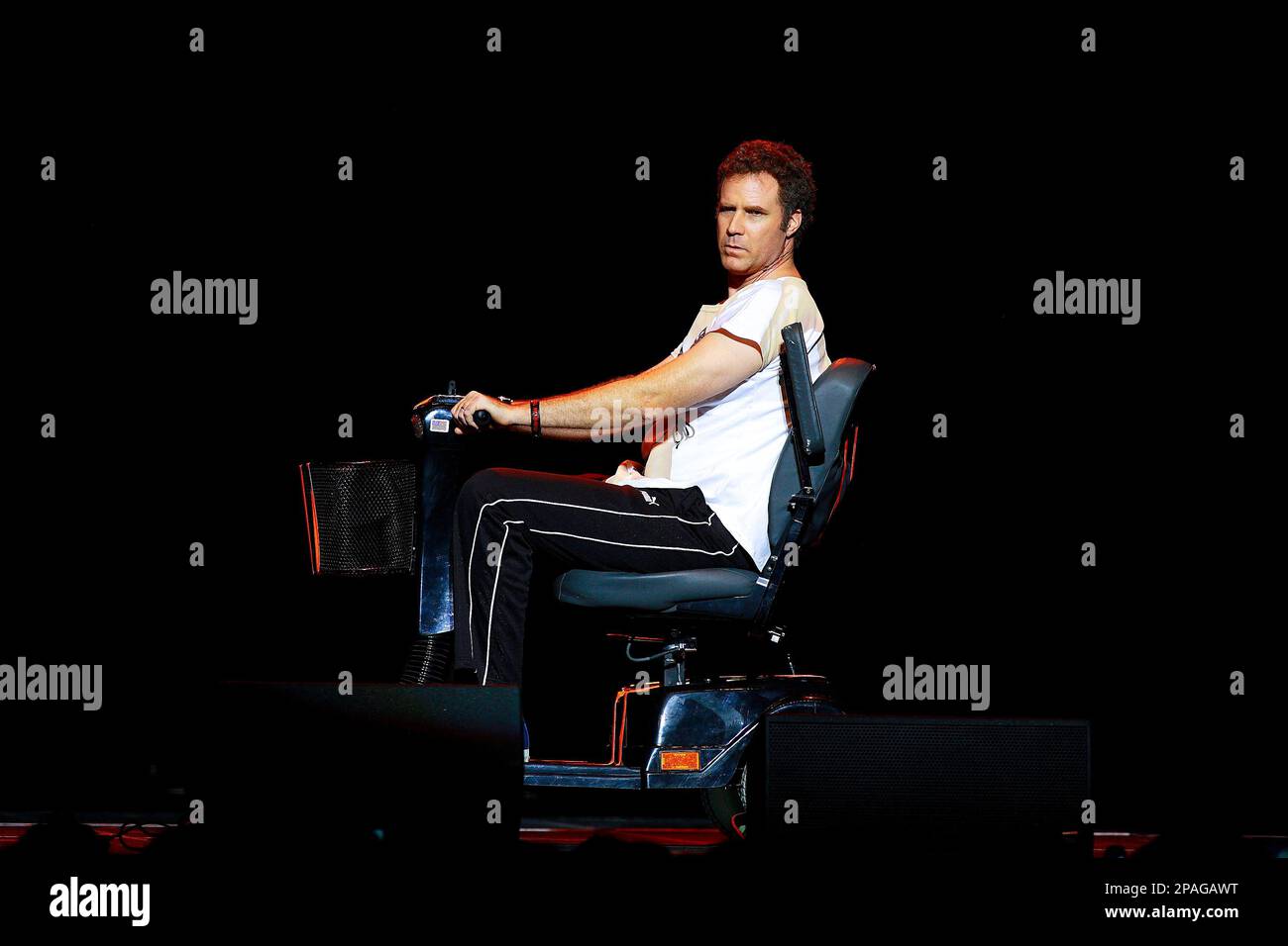Actor Will Ferrell wheels around the Value City Arena stage on his ...