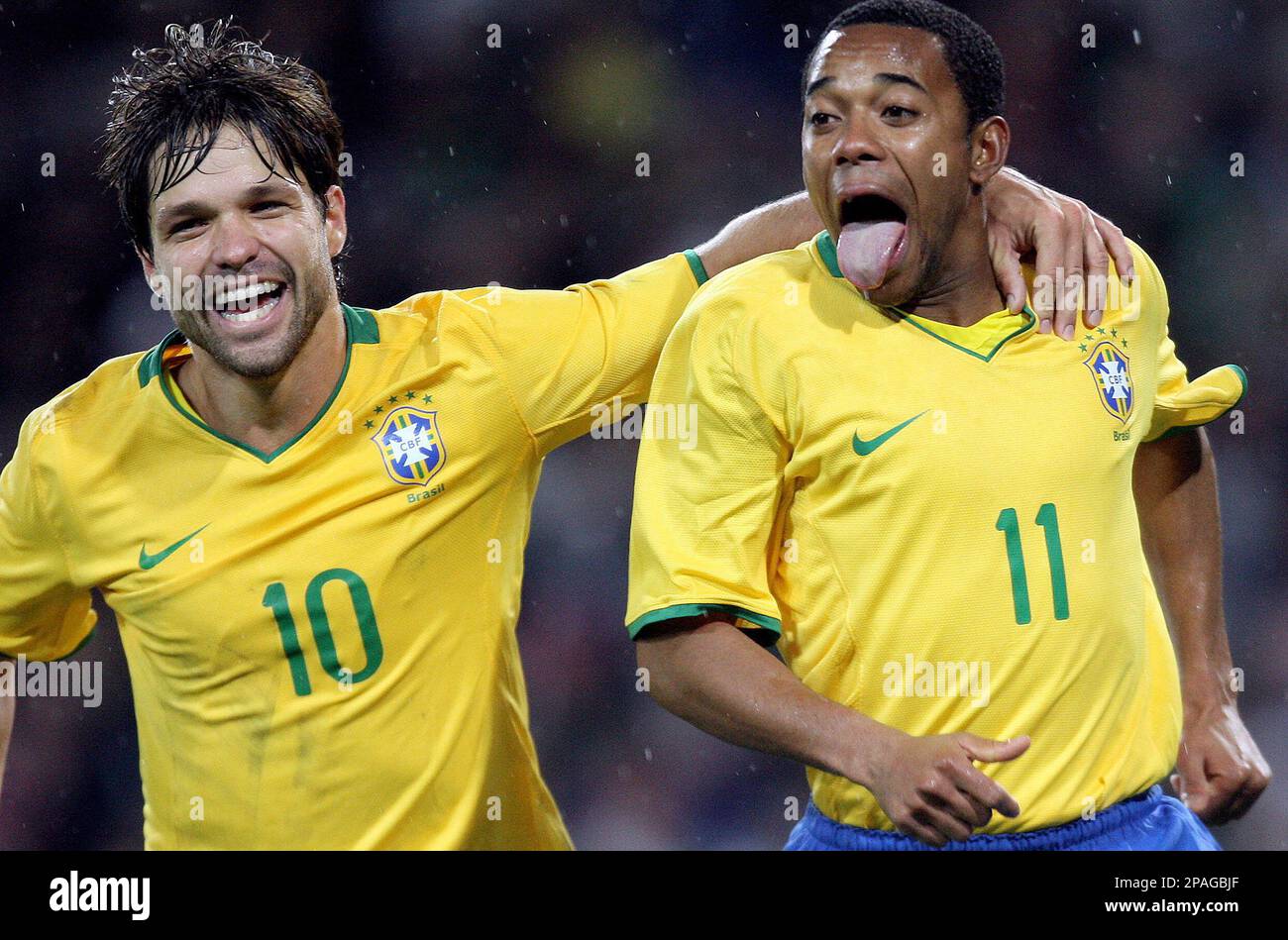 Brazil's Robinho, right, celebrates with Diego Ribas after Robinho ...