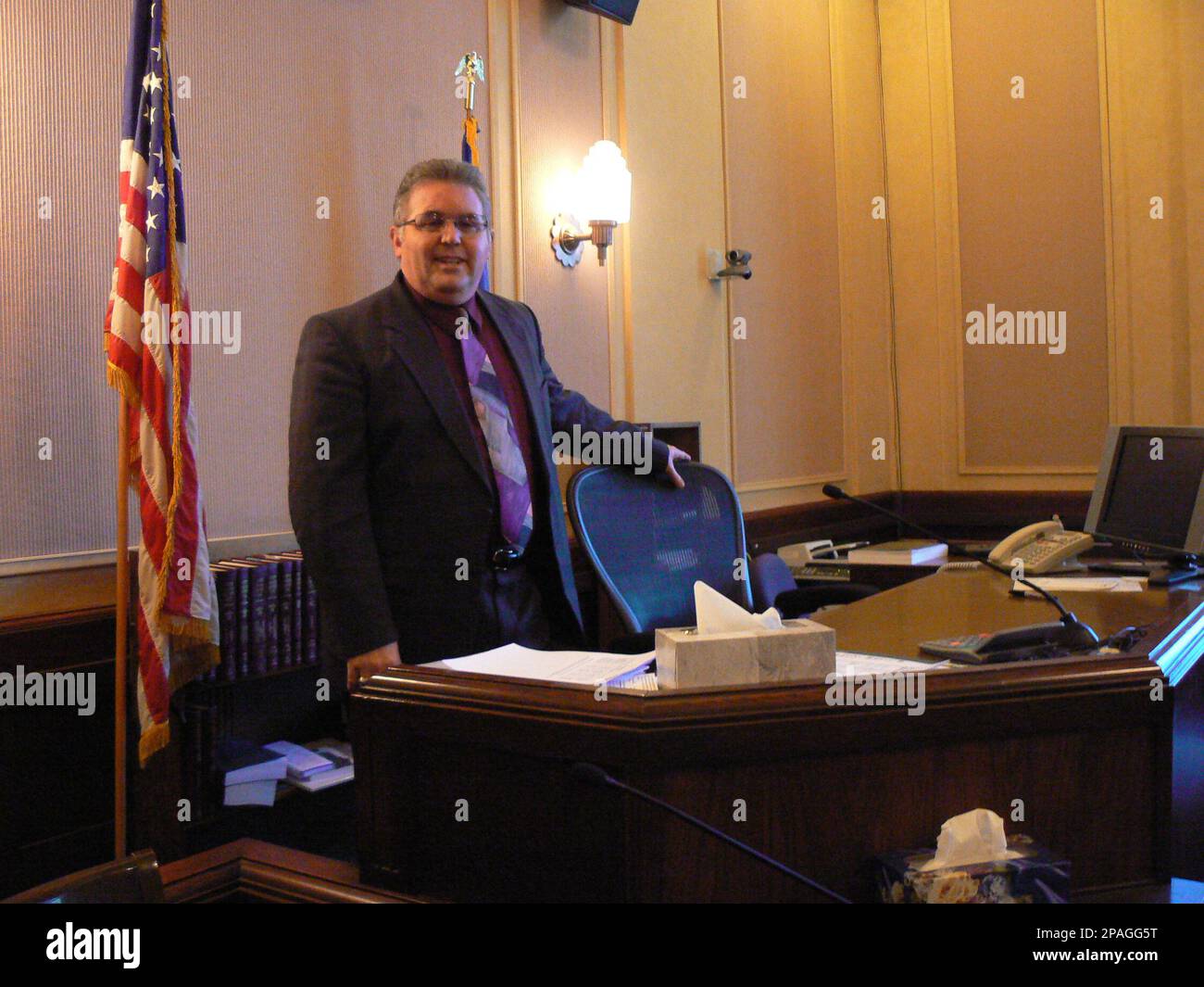 Northwest District Judge Richard Hagar stands on the bench Jan. 29 ...