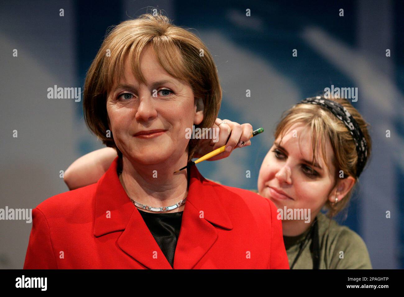 A staff artist put the finishing touch on the wax figure of German ...