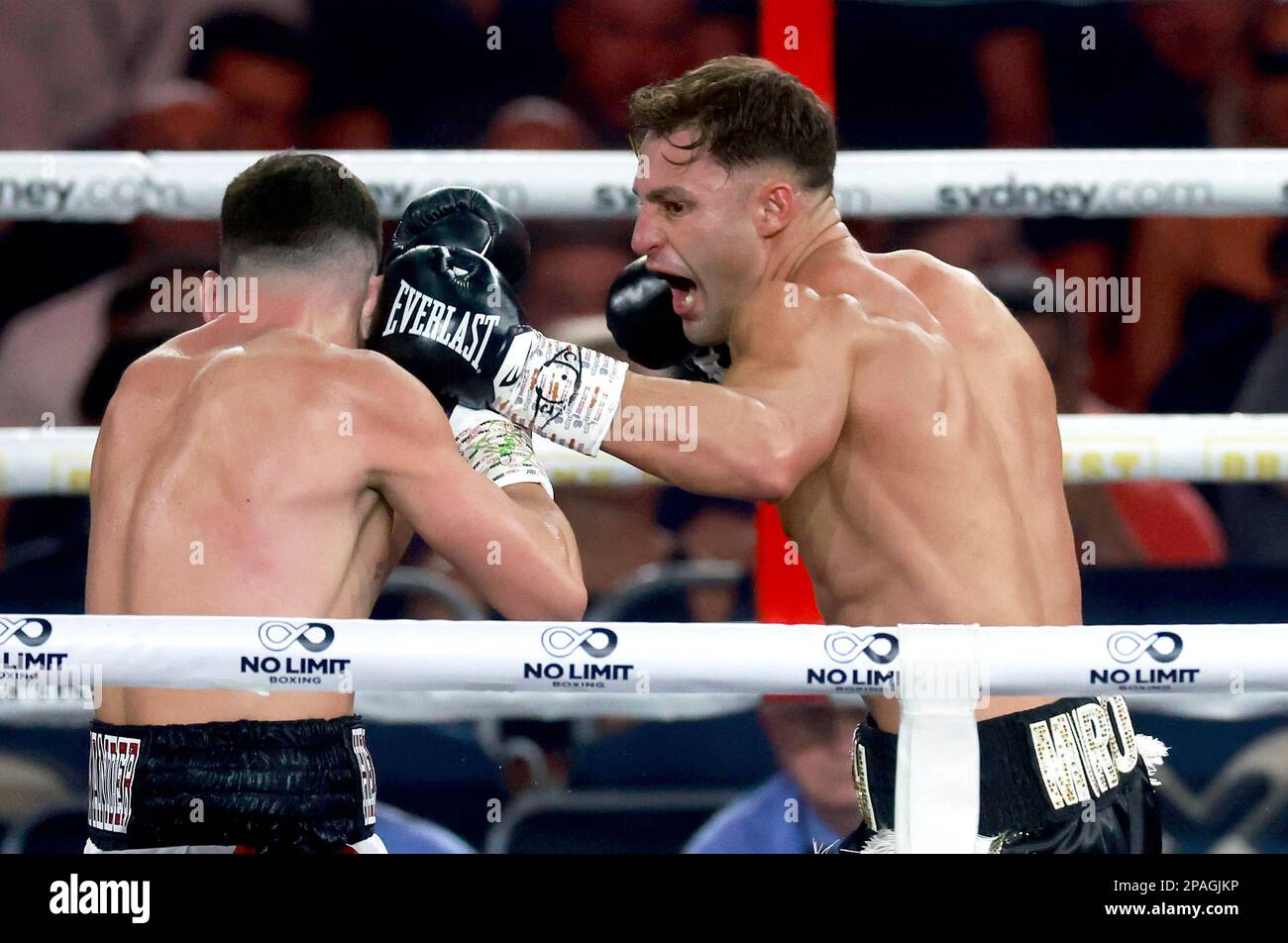 Rohan Murdock (R) strikes Issac Hardman during their IBF Australasian ...