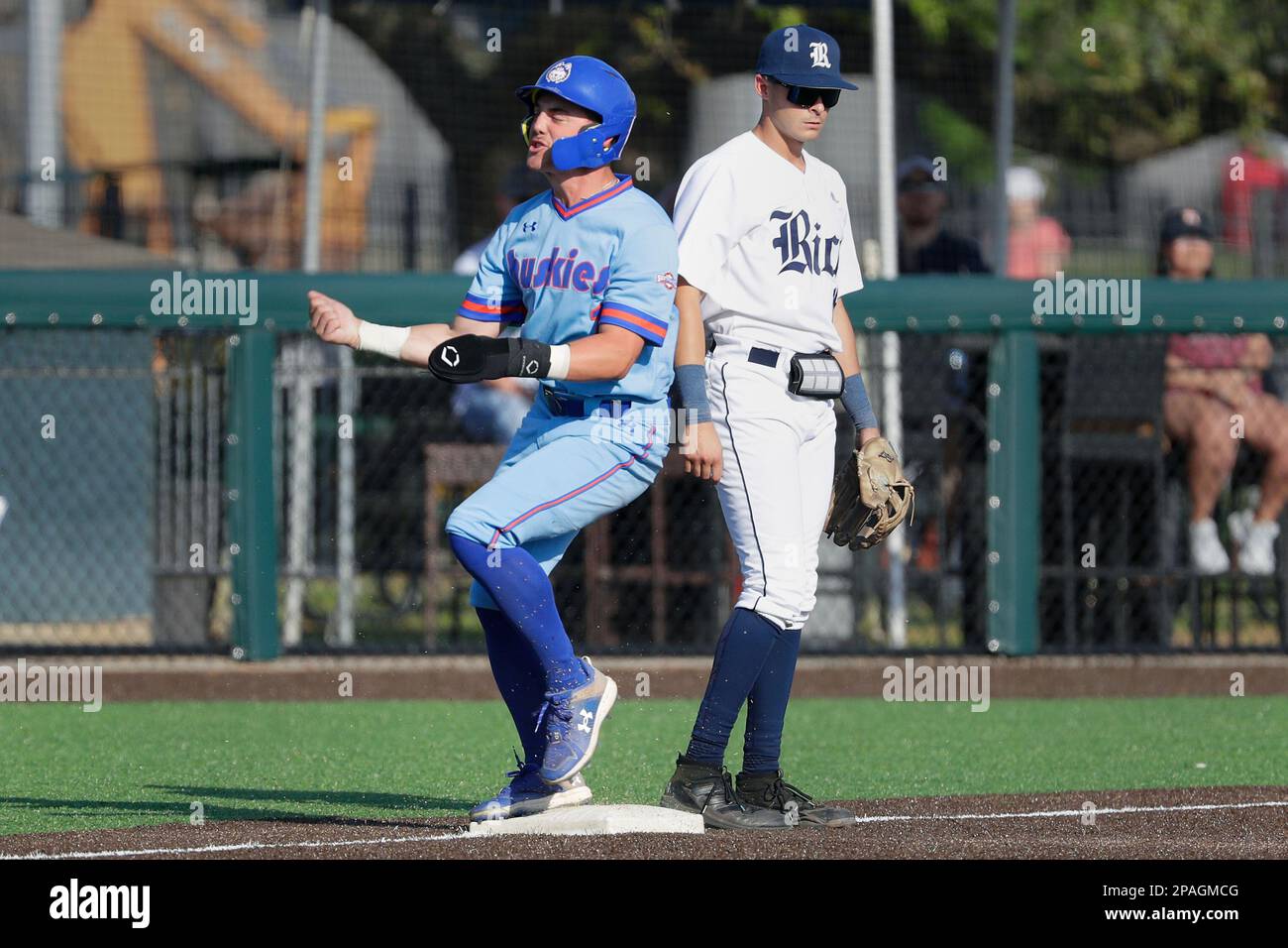 Houston Christian runner Trent Baker, left, celebrate his triple next ...