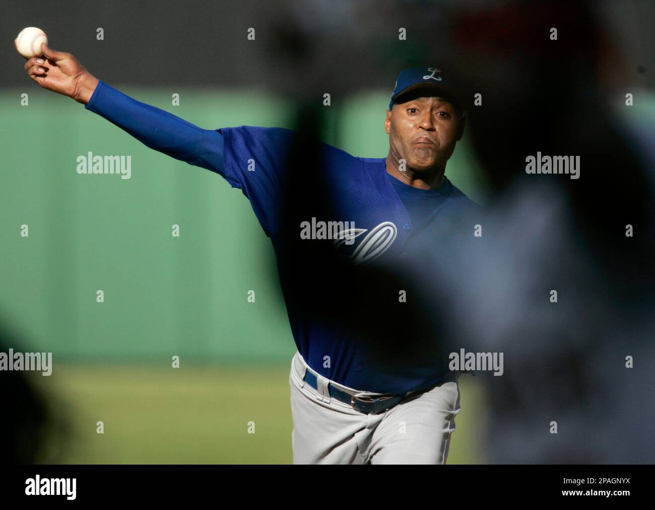 Jose Mercedes of the Dominican Republic's Licey Tigres throws in the ...