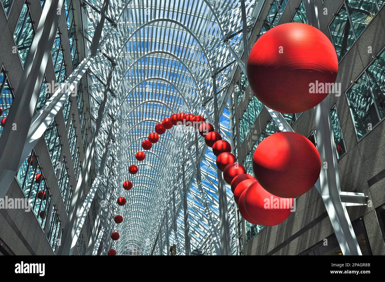 Diminishing perspective view of red balls in displayed in the atrium ...