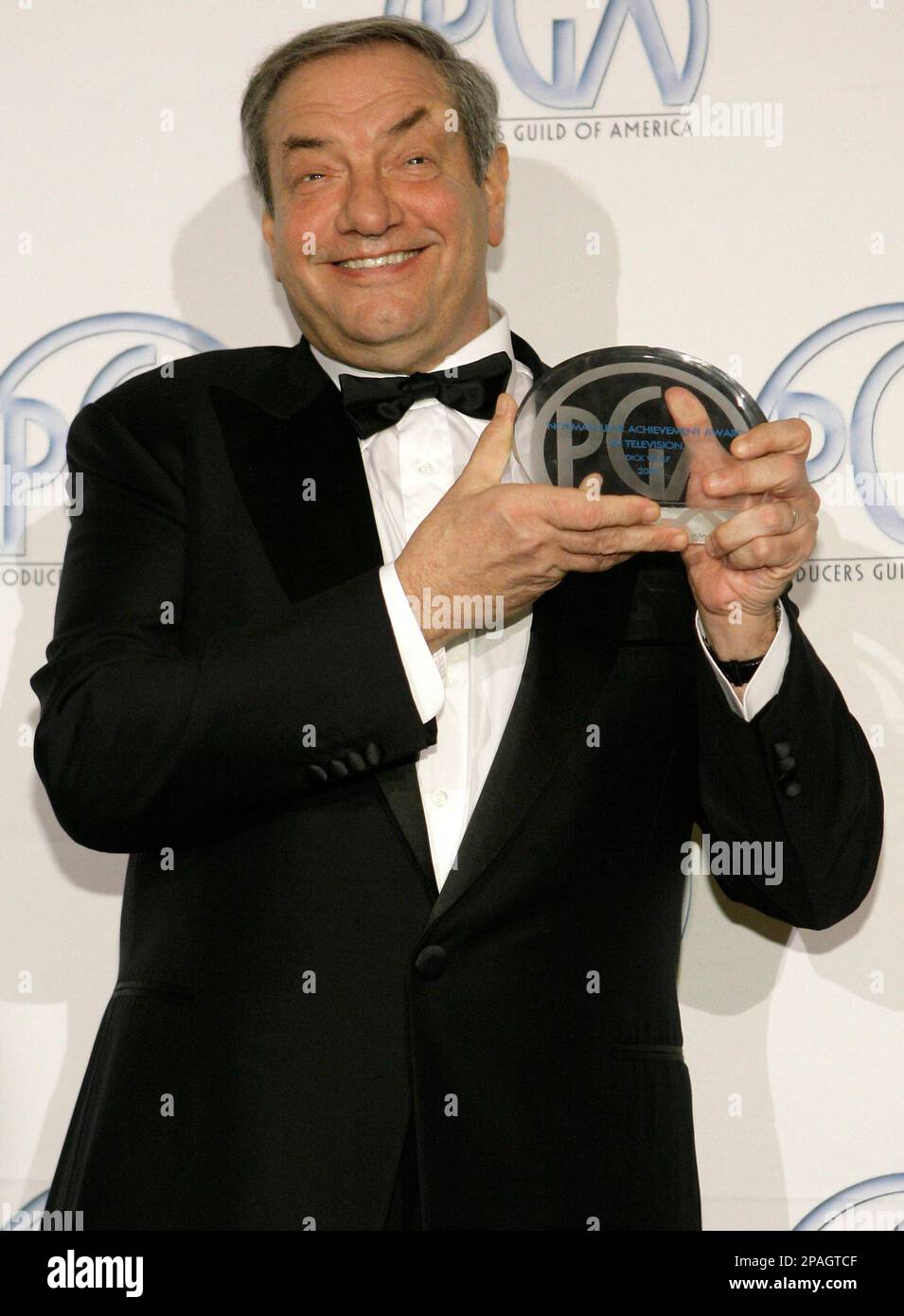Writer and producer Dick Wolf poses with his Norman Lear Achievement ...