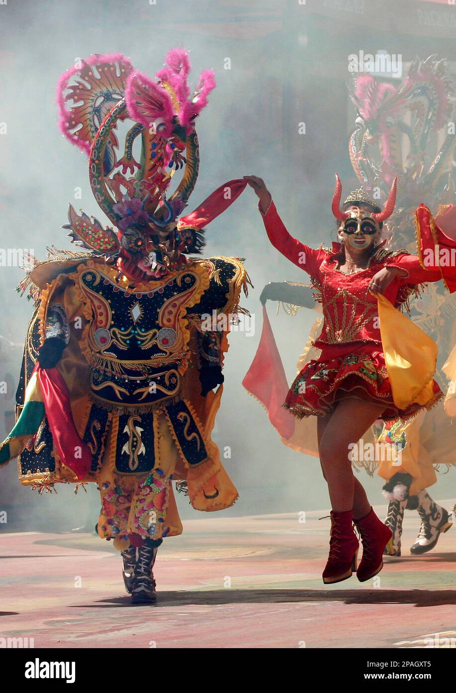 Dancers perform a traditional devil dance to celebrate carnival and pay ...