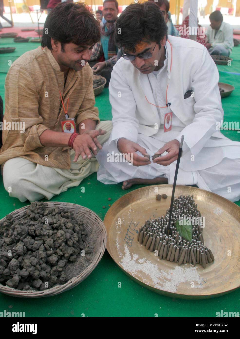 Bollywood actors Rajpal Yadav, left and Ashutosh Rana shape dhoop or ...