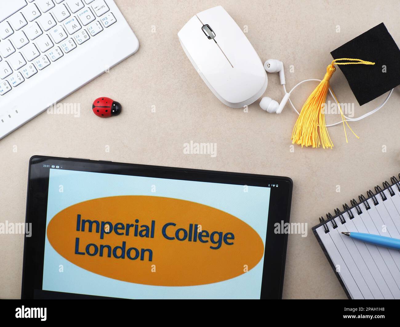 In this photo illustration, Imperial College London logo seen displayed ...