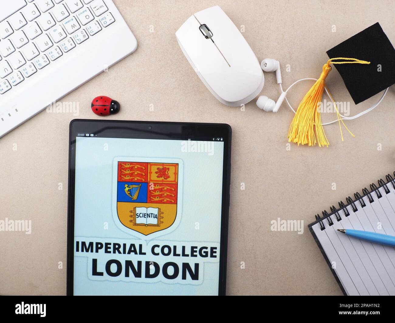 In this photo illustration, Imperial College London logo seen displayed ...