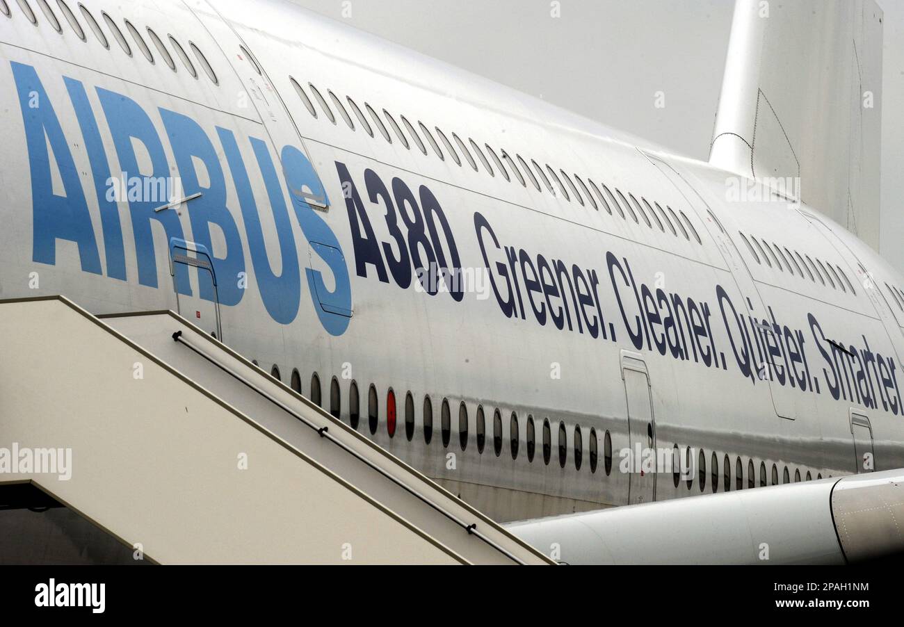 An Airbus A380 lands after its first alternative fuel test flight ...