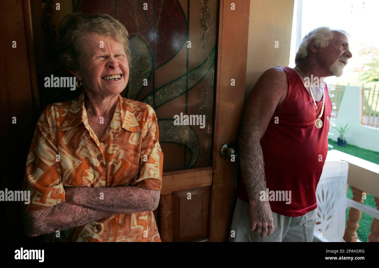 Puerto Ricans Rita Nieve, left, and her husband Miguel, who suffer from ...