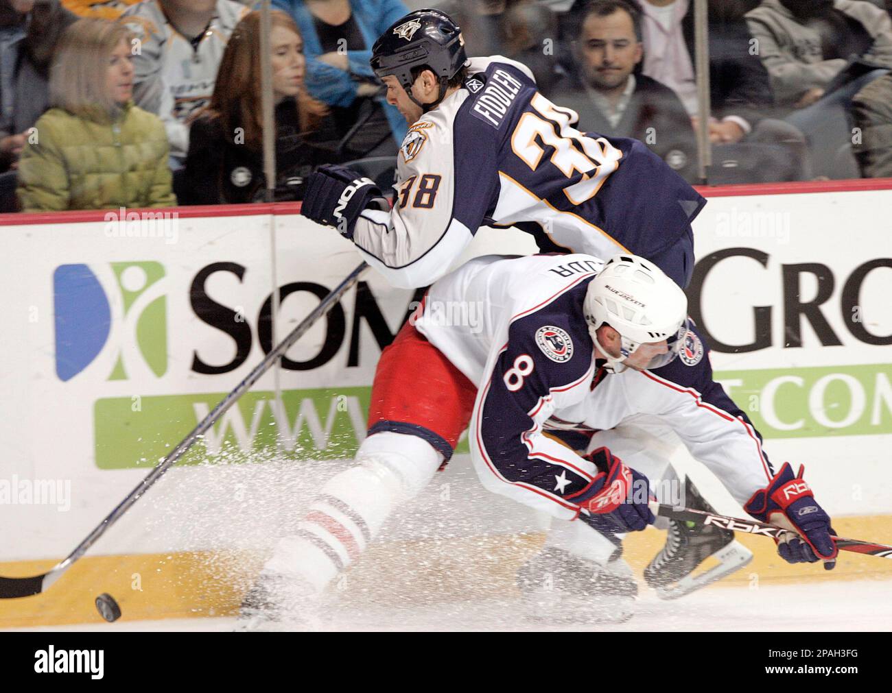 Nashville Predators left wing Vernon Fiddler (38) collides with ...