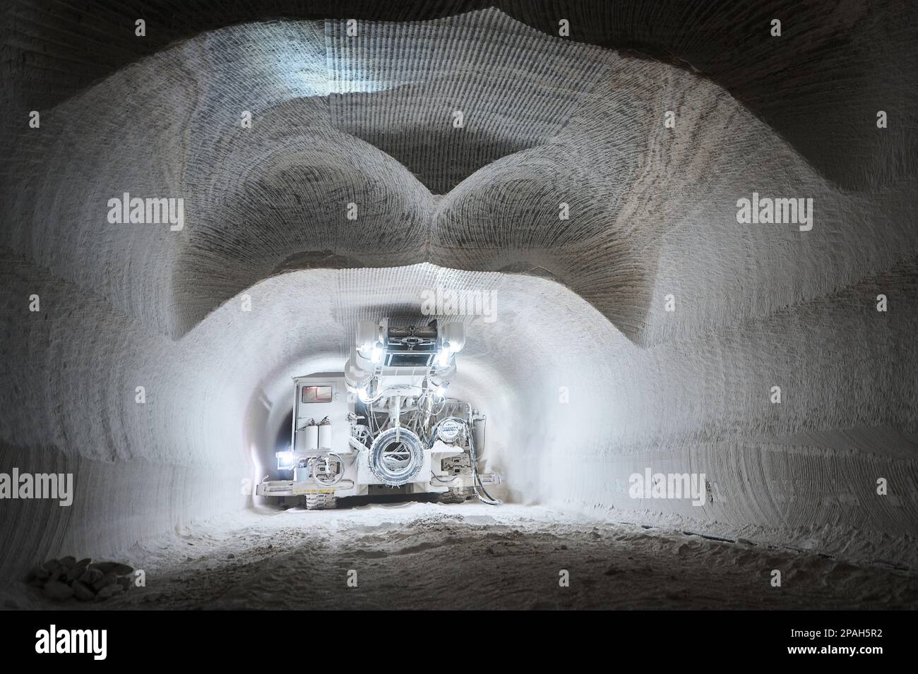Mining drilling machine works in tunnel of salt quarry Stock Photo - Alamy