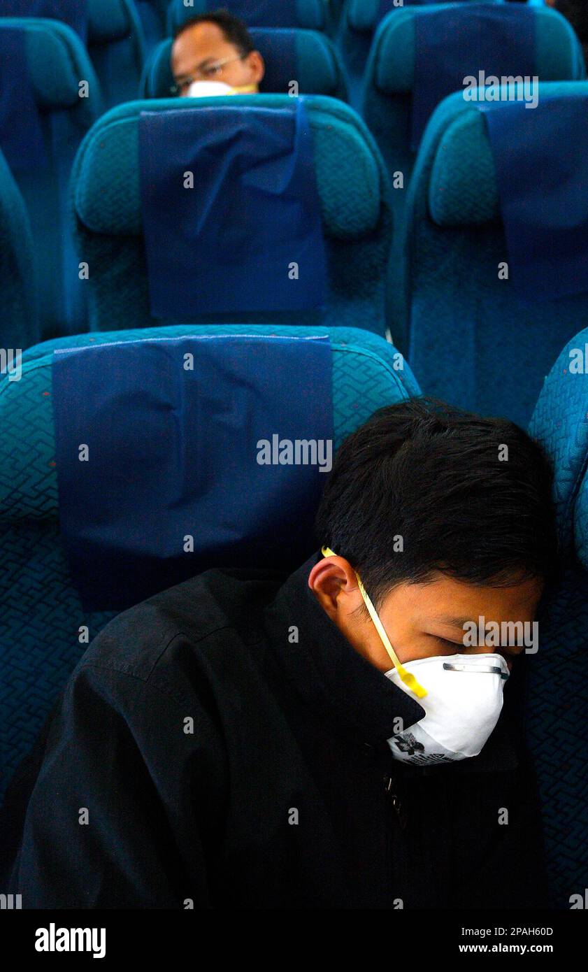 "Sick" passengers are separated on an air plane during a Pandemic ...