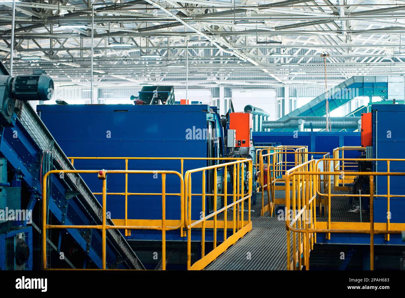 Production line with conveyors at waste recycling plant Stock Photo - Alamy