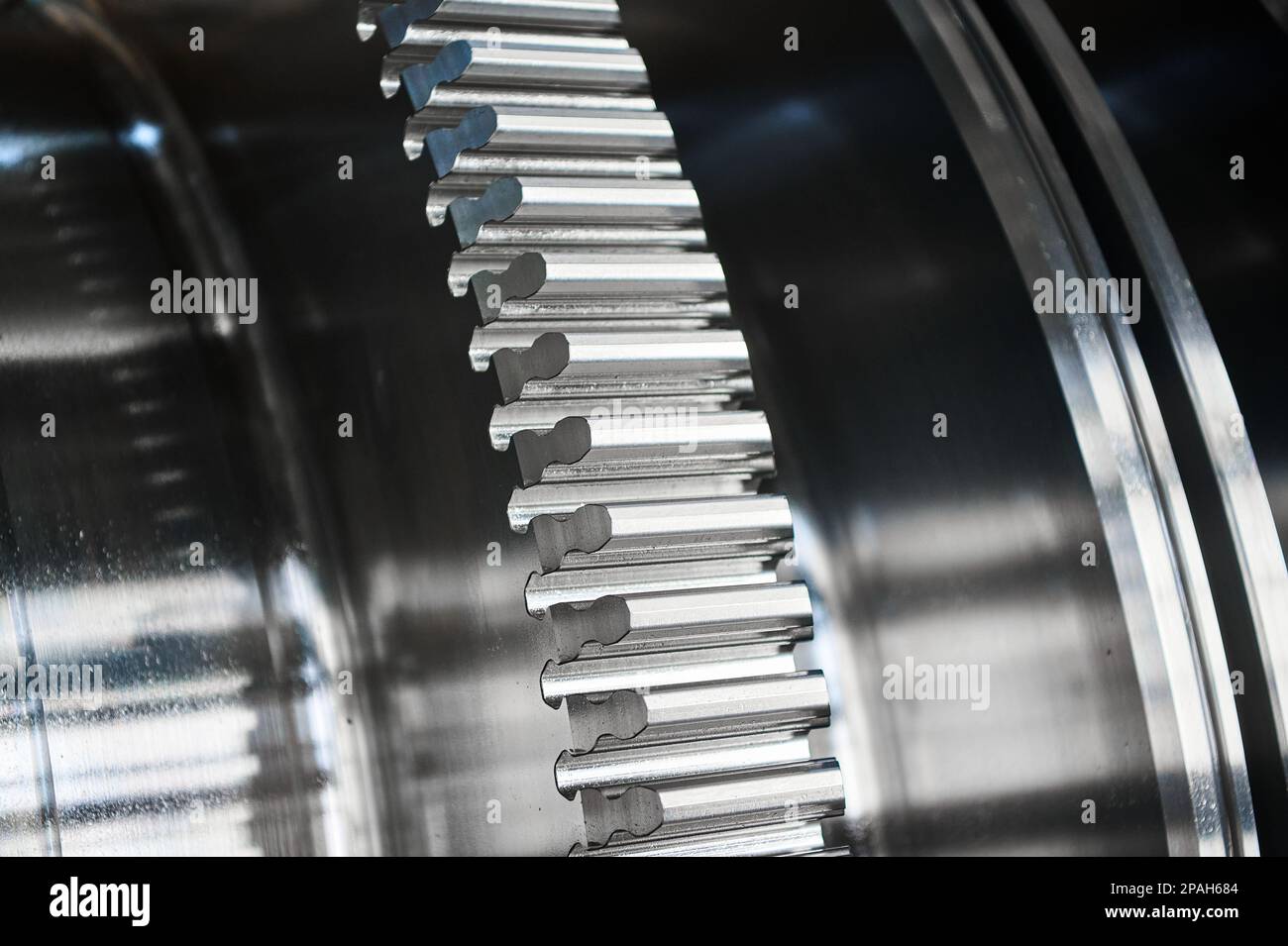 Steam turbine shaft with fir-tree blade fastening at plant Stock Photo ...