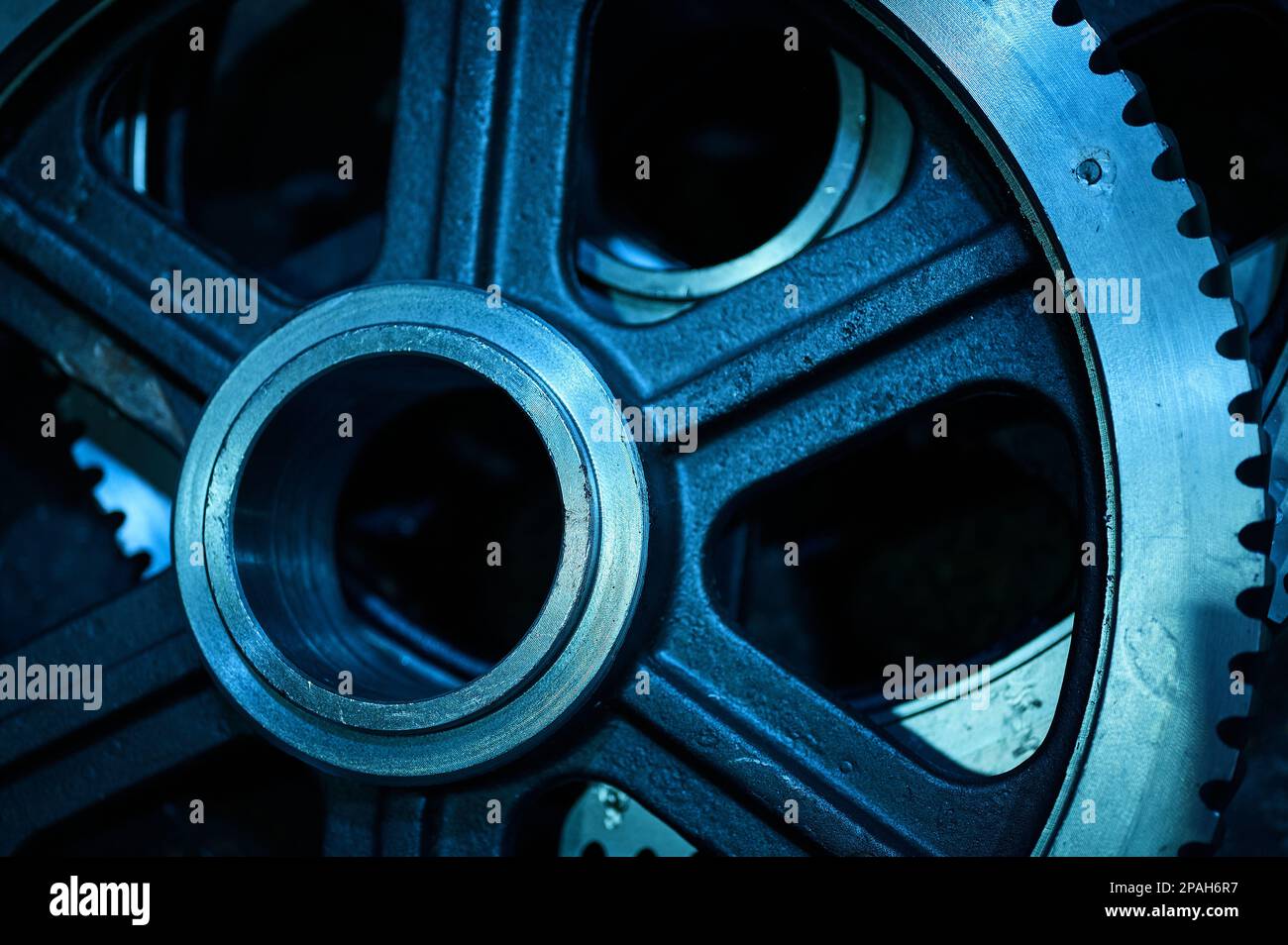 Pile of metal cogwheels for spiral gear drive in warehouse Stock Photo ...