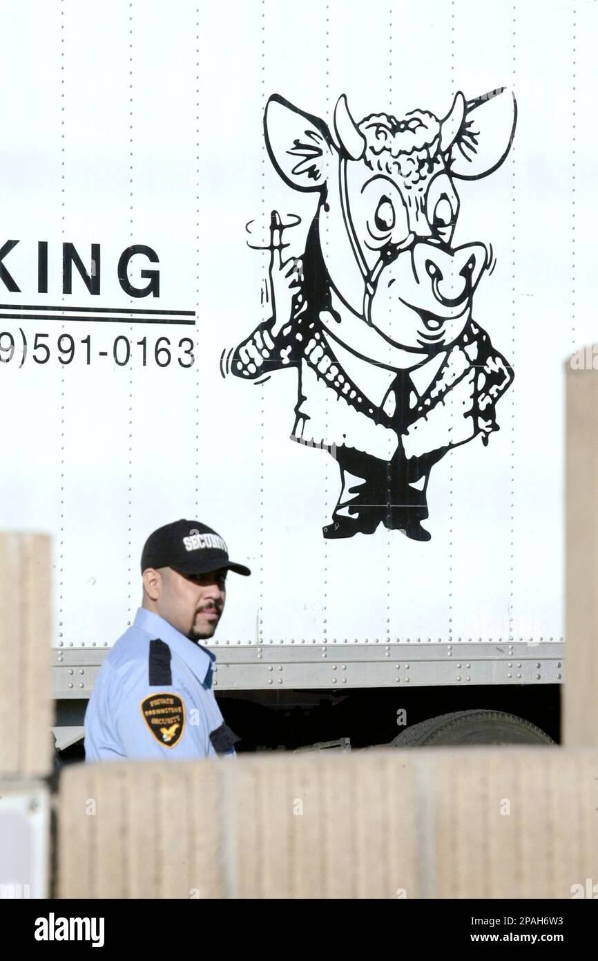 A private security guard patrols the parking lot at the Hallmark Meat ...