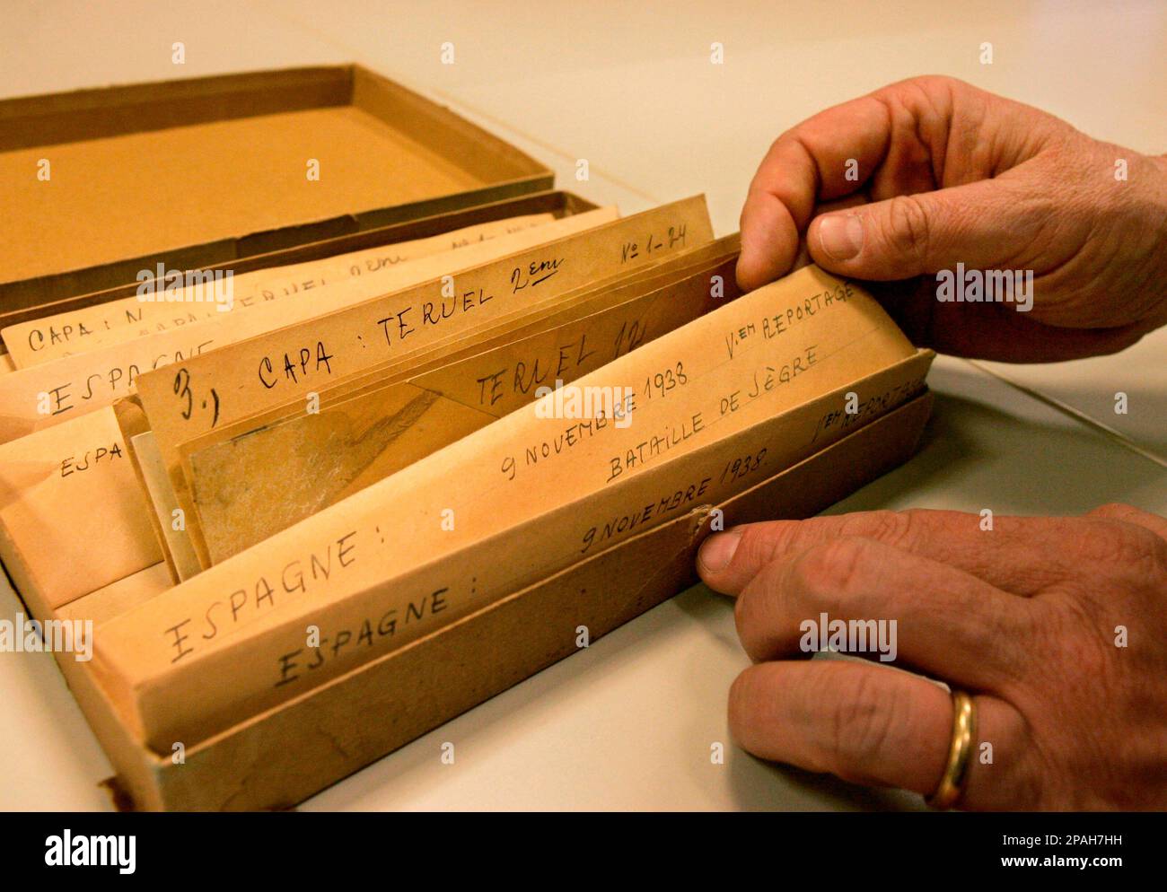 Chief curator Brian Wallis looks through some of the thousands of ...