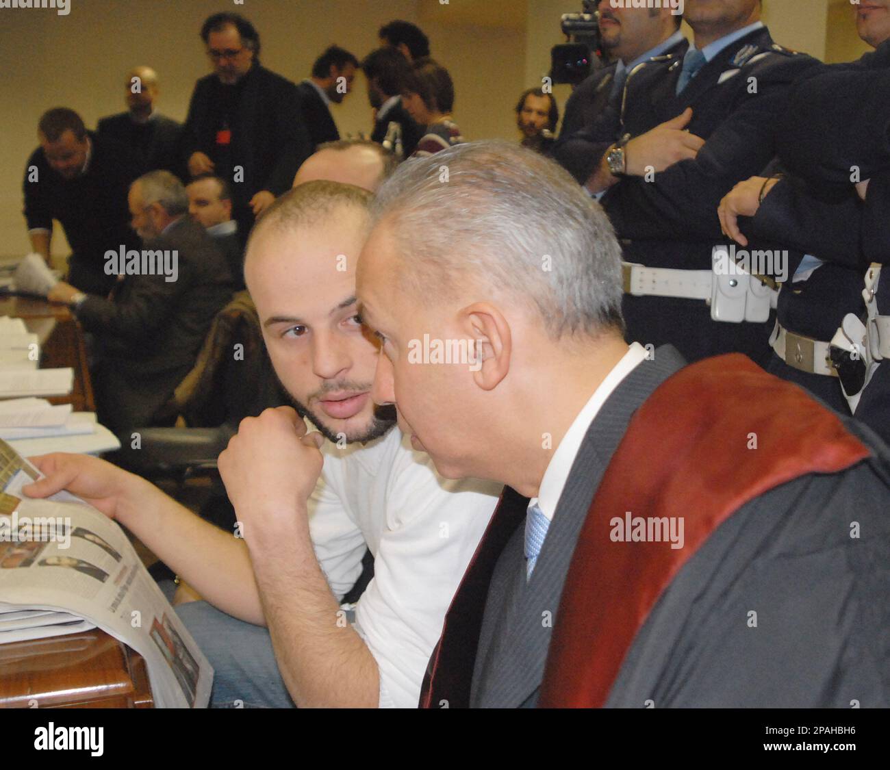 Azouz Marzouk, left, father of the killed baby Youssef, and lawyer ...