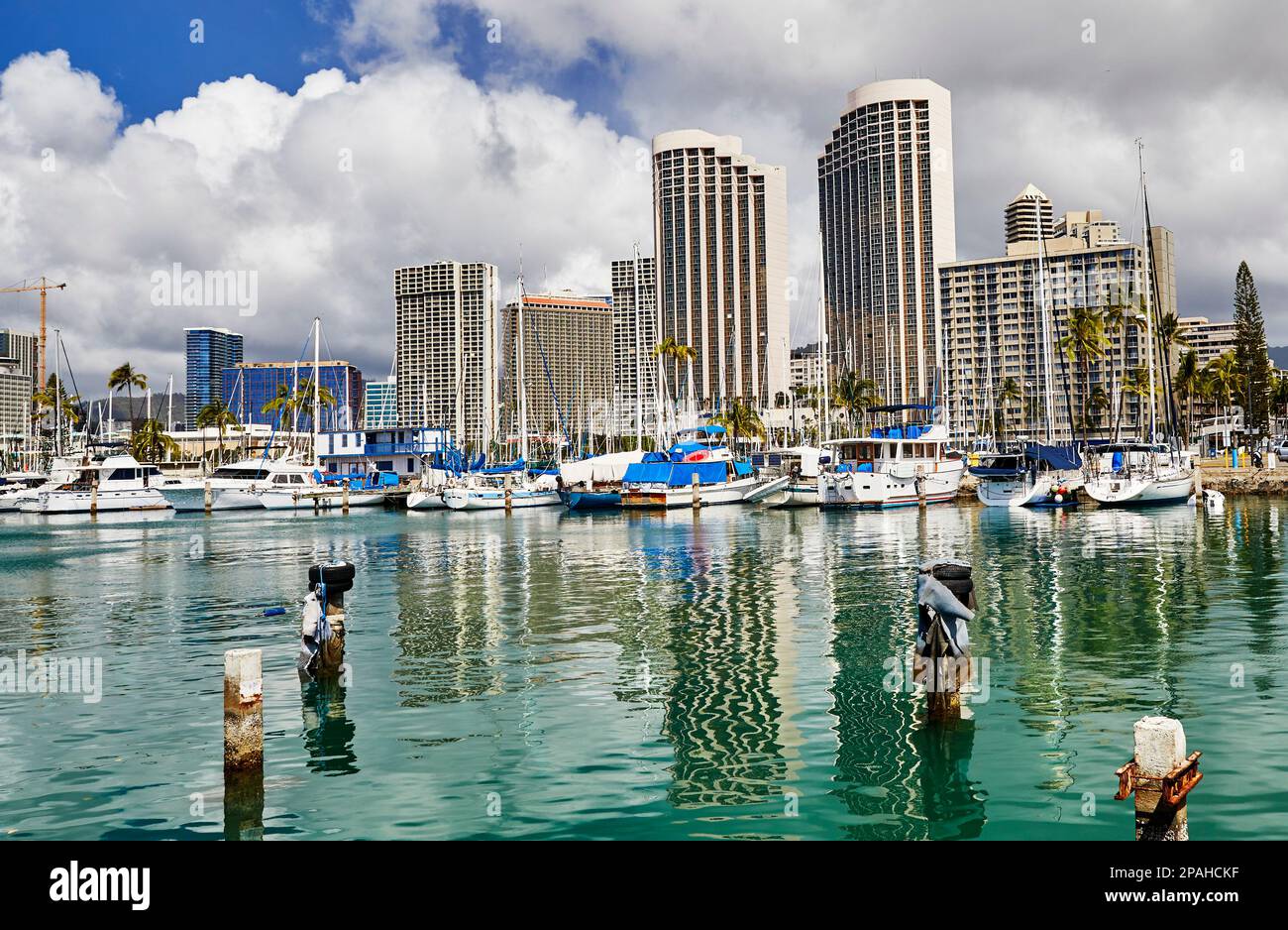 Boat Harbor with skyline view of Honolulu, Hawaii in the background ...