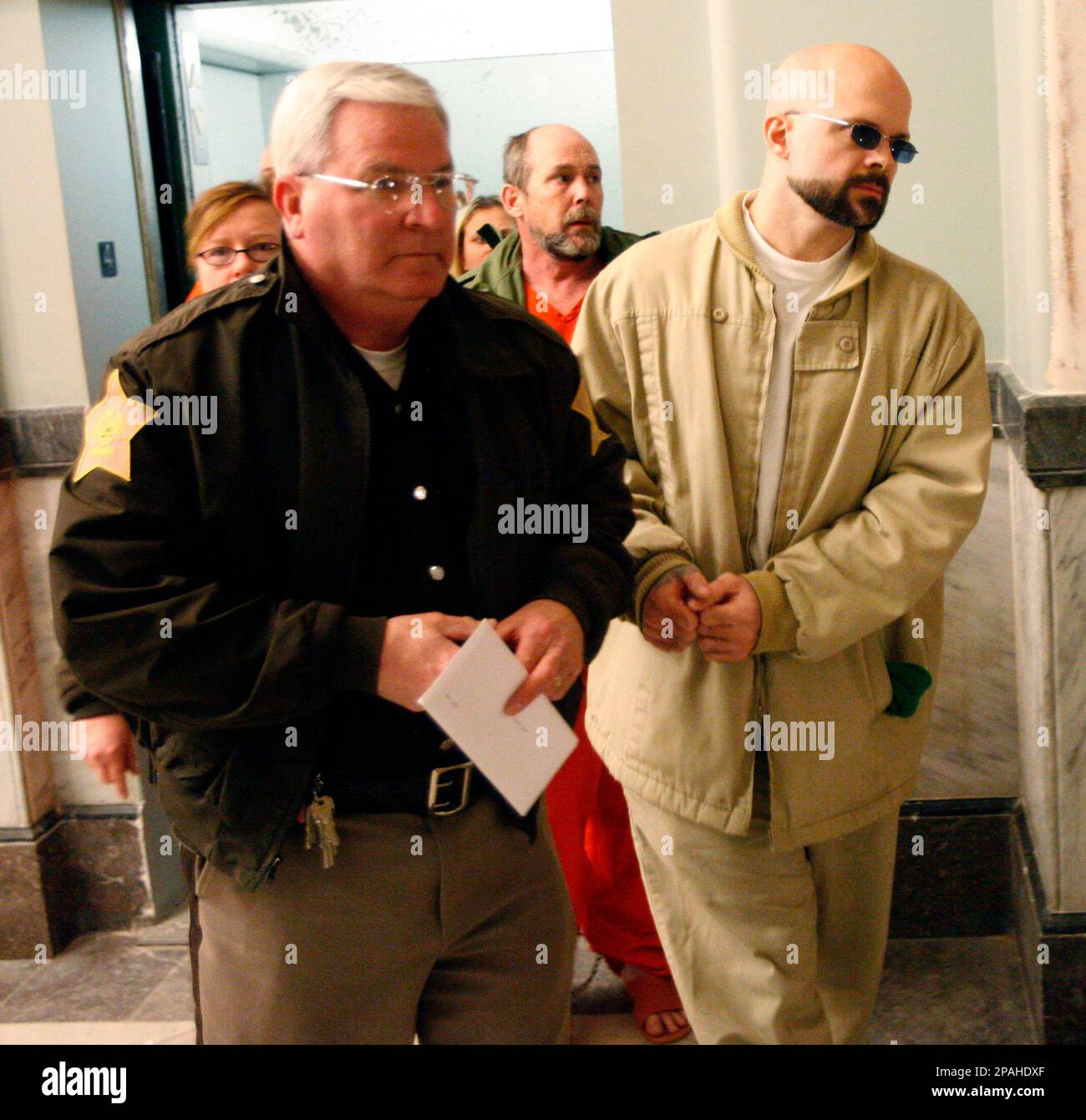 David Scott, right, arrives for a court hearing following the discovery ...