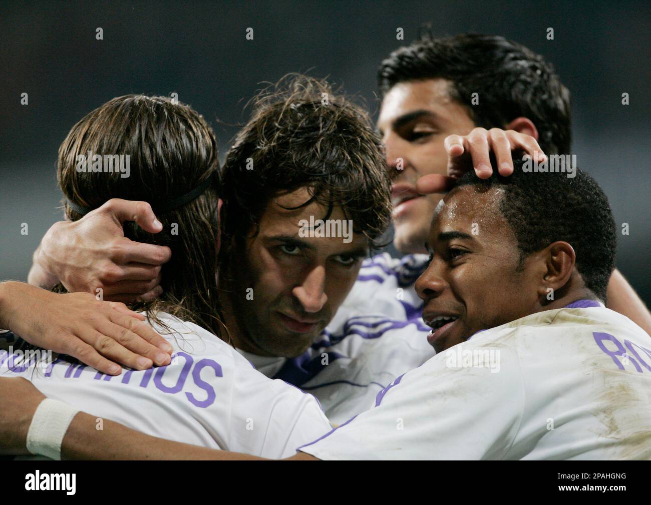 Real Madrid players congratulate Robinho, from Brazil, right, after ...