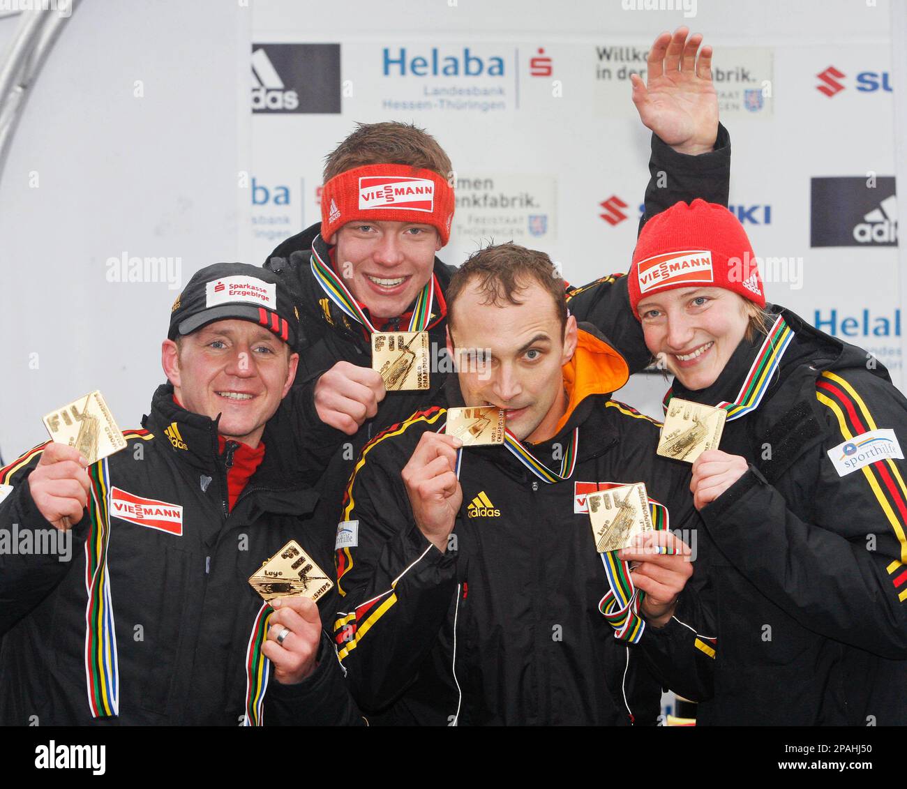 World champions Torsten Wustlich, Felix Loch, Andre Florschuetz and Tatjana Huefner, all from ...