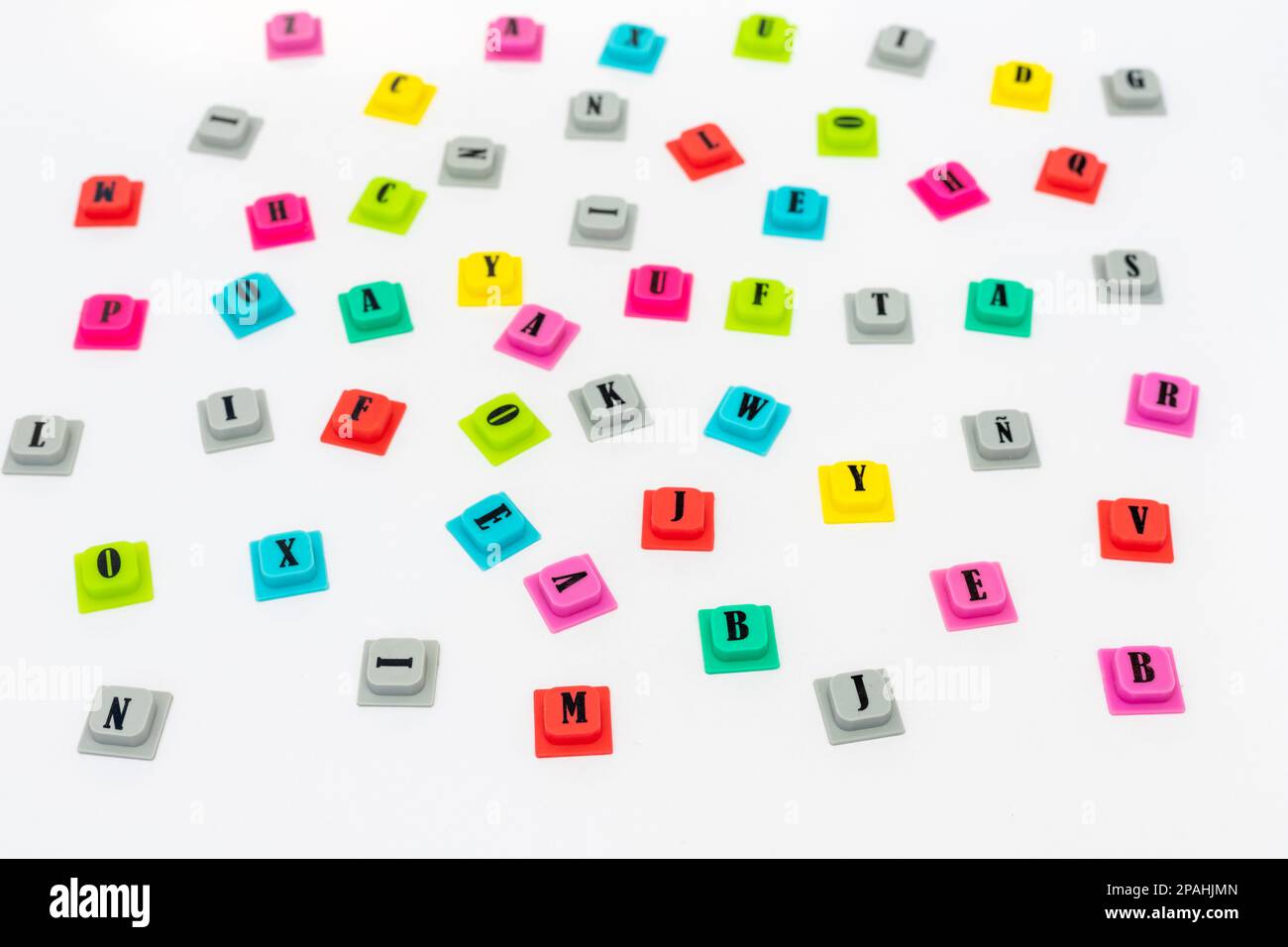 Randomly scattered alphabetic letters on isolated white background ...
