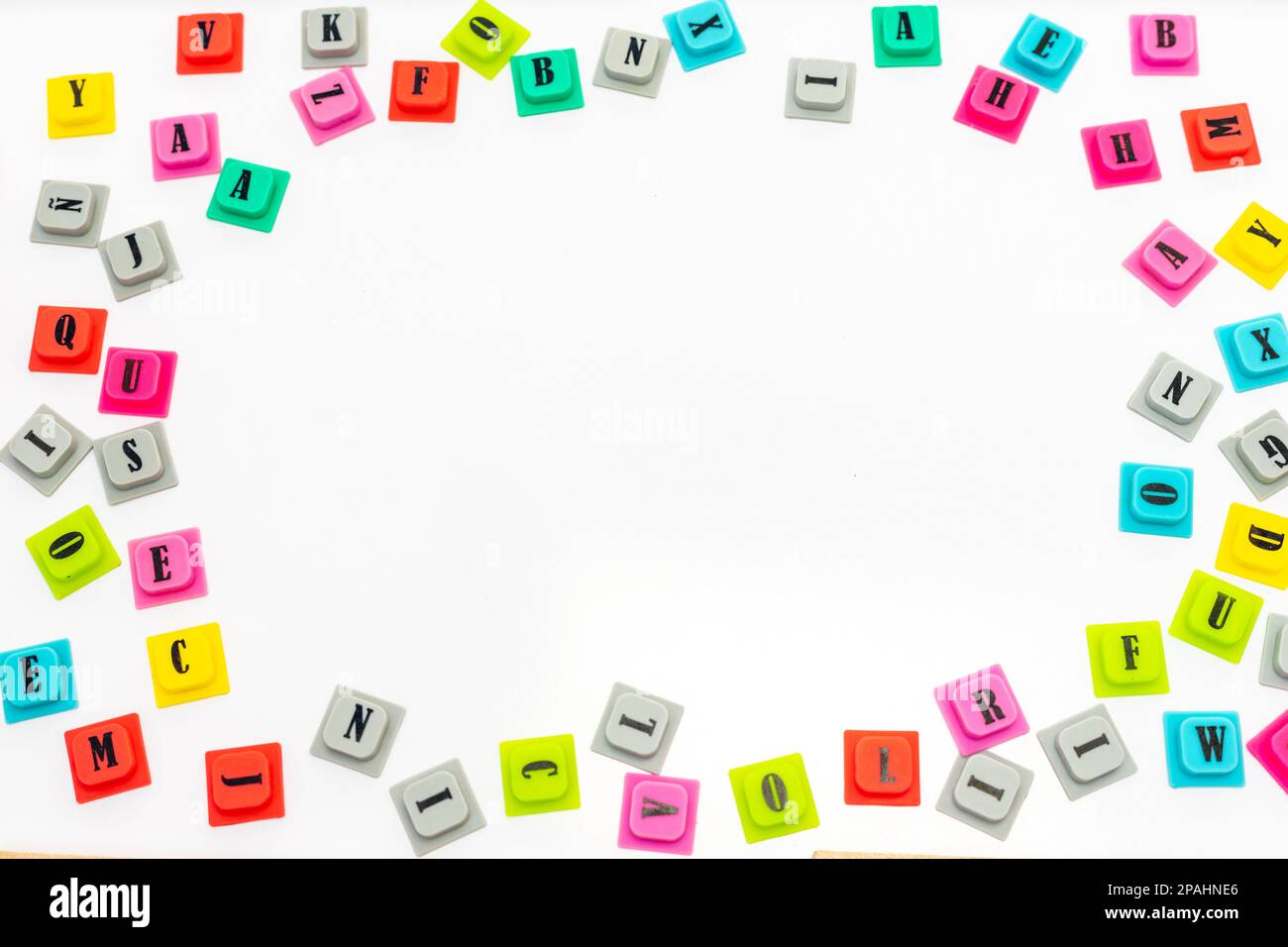 White blank background with colorful alphabetic letters randomly ...