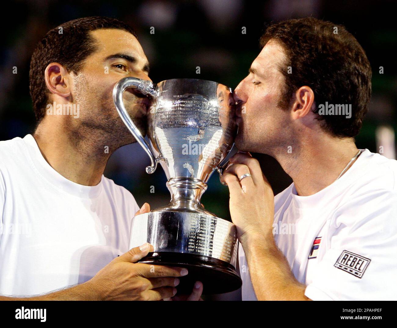 Israel's Jonathan Erlich, right, and his compatriot Andy Ram, kiss a ...