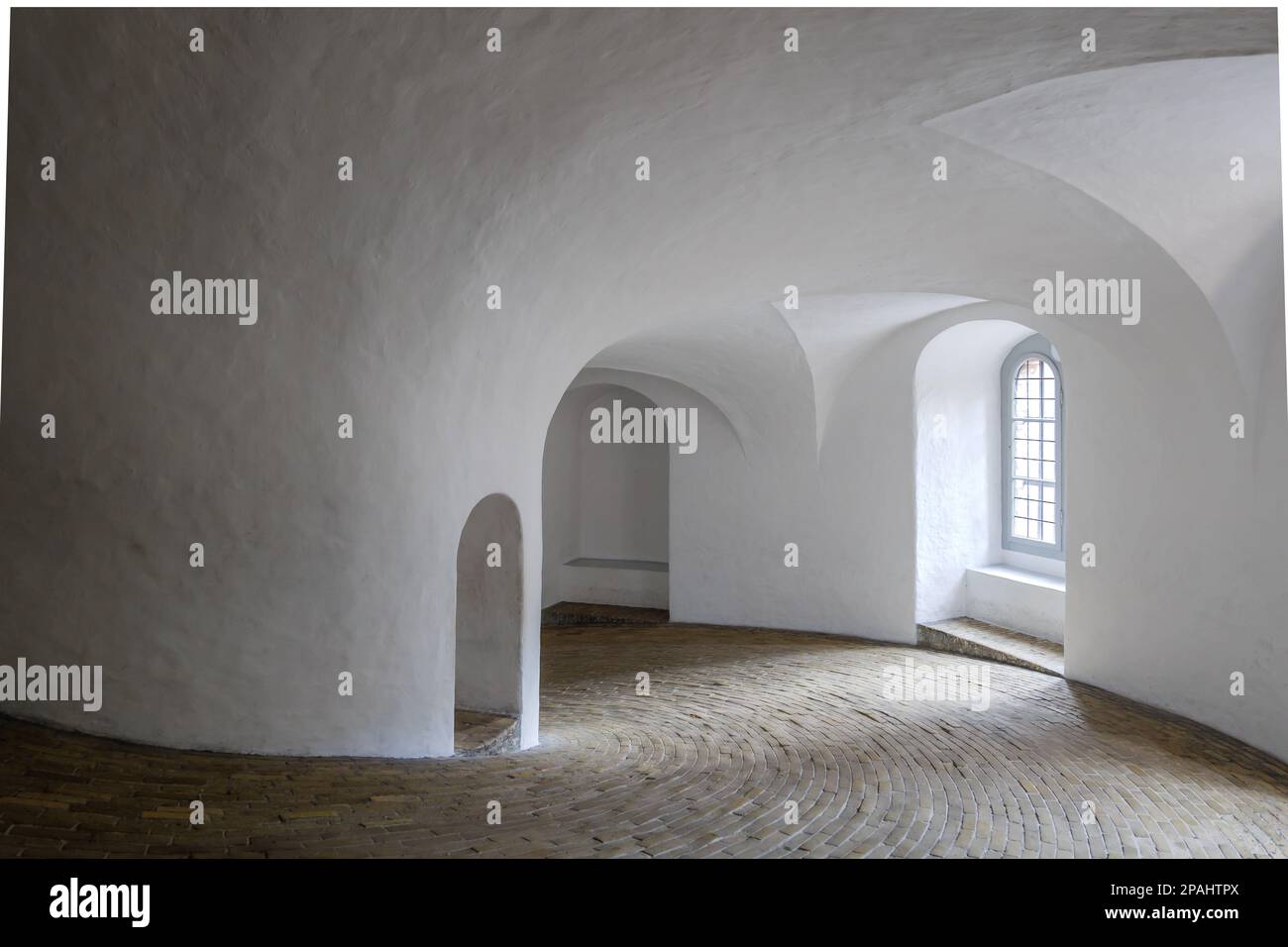 Interior view on spiral ramp at The Round Tower Stock Photo - Alamy