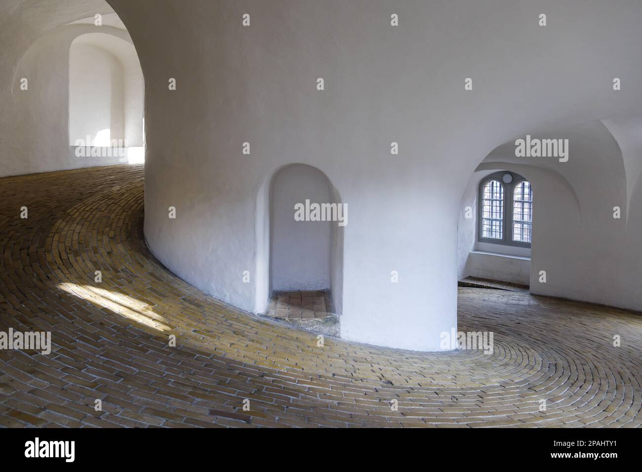 Interior view on spiral ramp at The Round Tower Stock Photo - Alamy