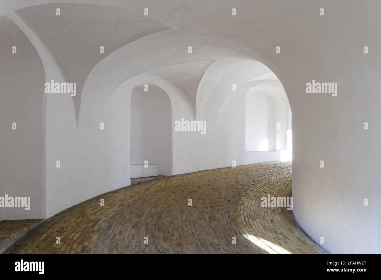 Interior view on spiral ramp at The Round Tower Stock Photo - Alamy