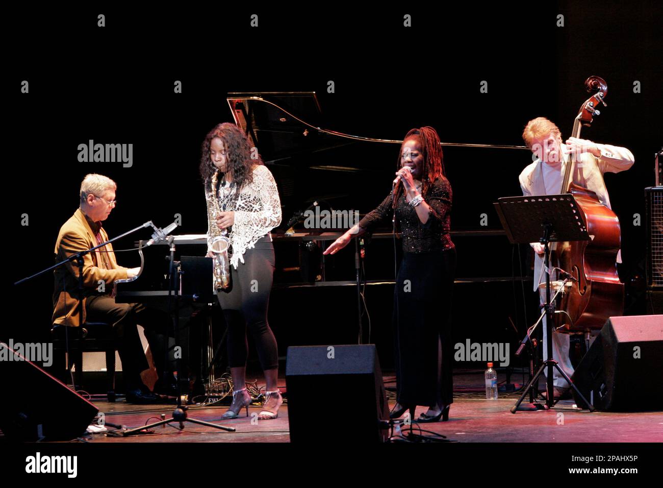 Tia Fuller, second left, and Catherine Russell, second right, perform ...