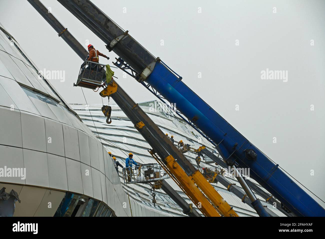 Construction workers in mobile hydraulic construction platform Stock ...