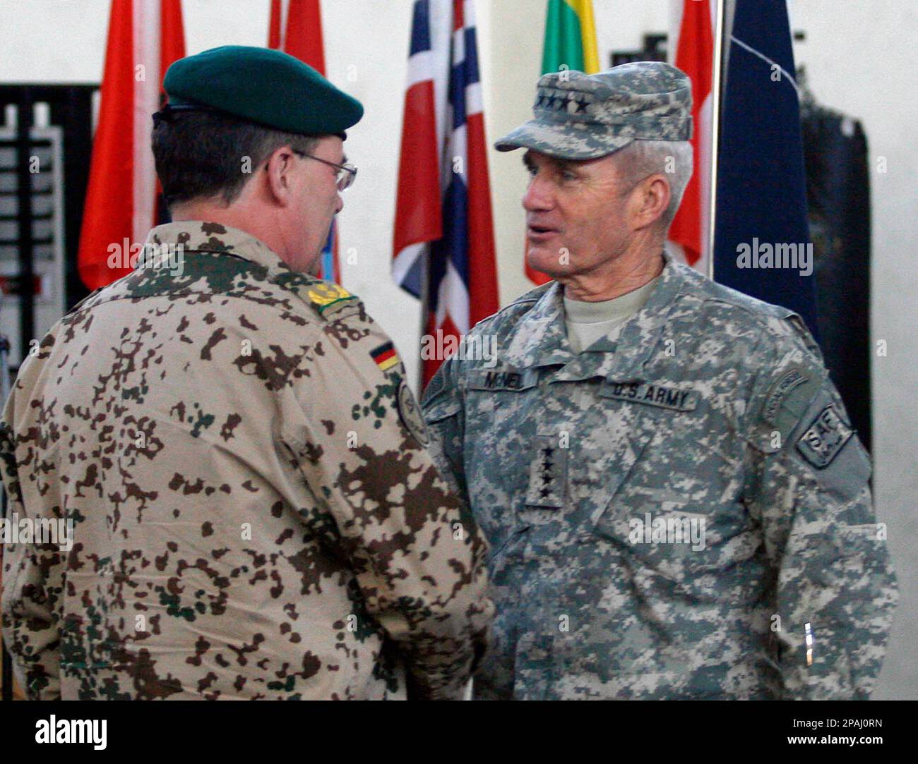 U.S. General Dan.K. McNeill, right, shakes hand with Out going German ...