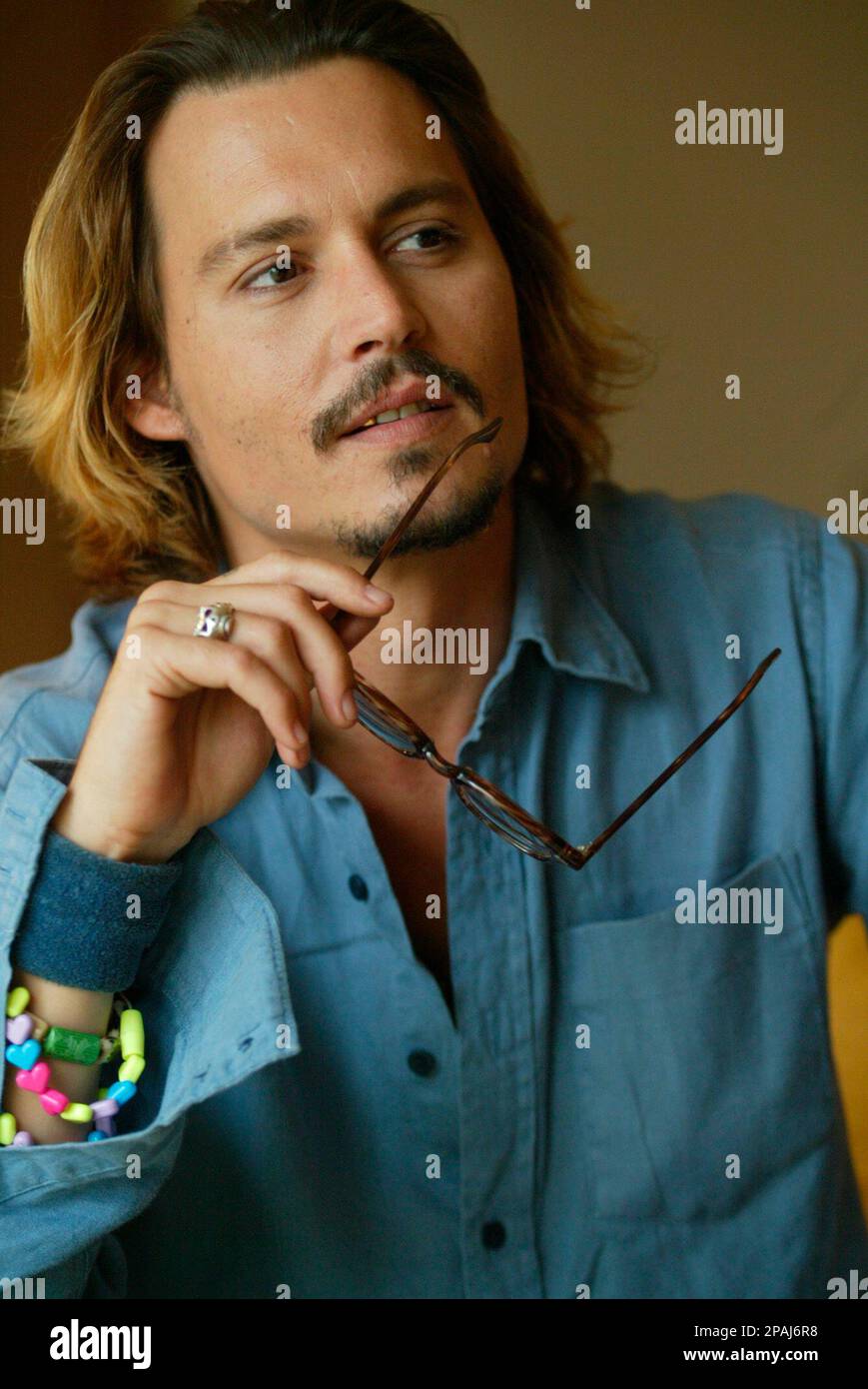 Actor Johnny Depp pauses during a photo session June 21, 2003, in Los ...